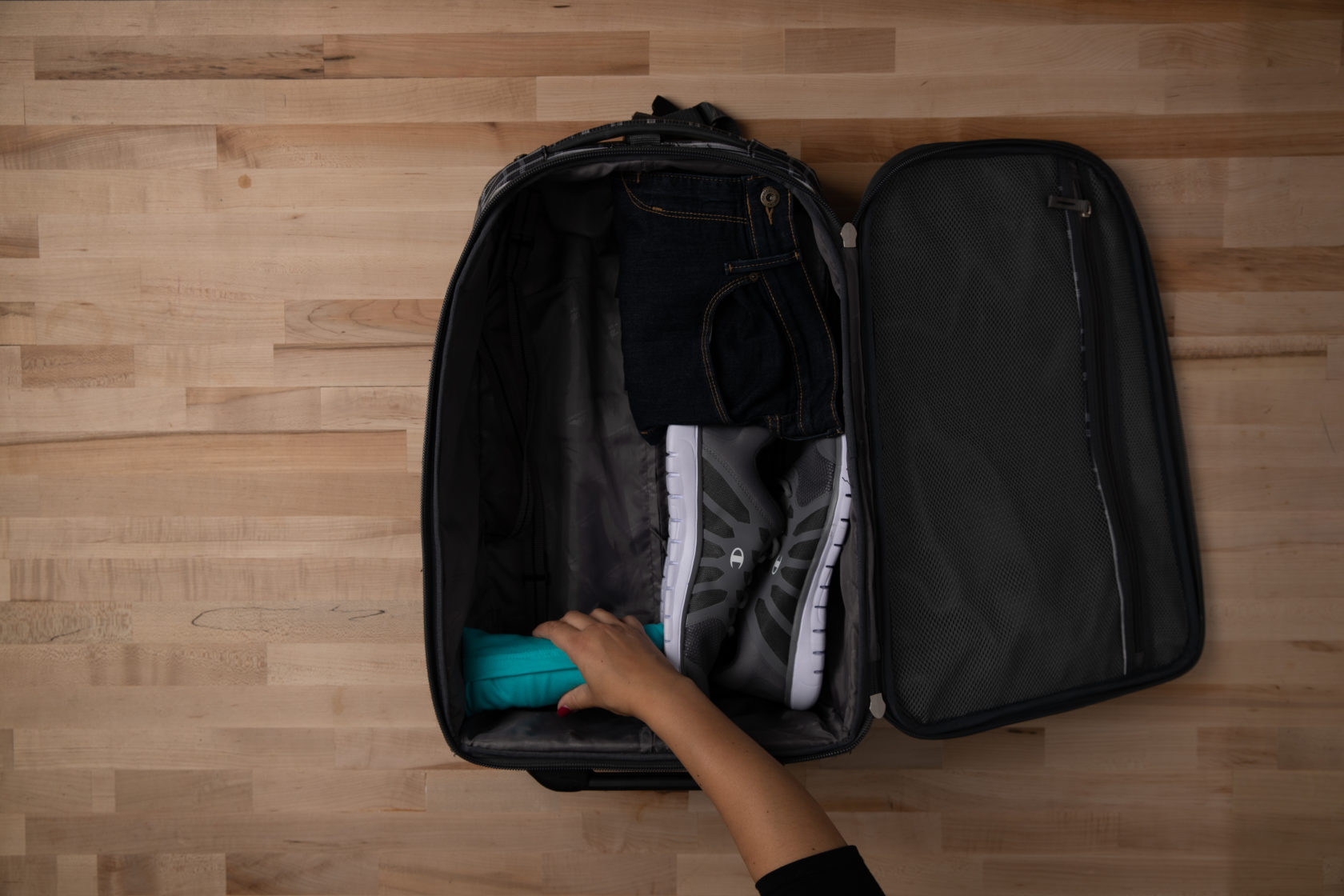 How to Pack Shirts for Travel (Step-By-Step) - Custom Ink Blog